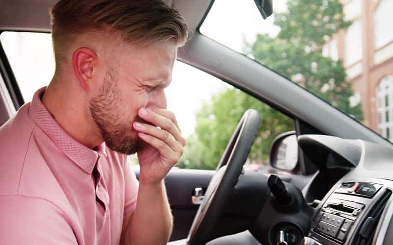 Why Does My New Car Have A Burning Smell? | Germain Cars